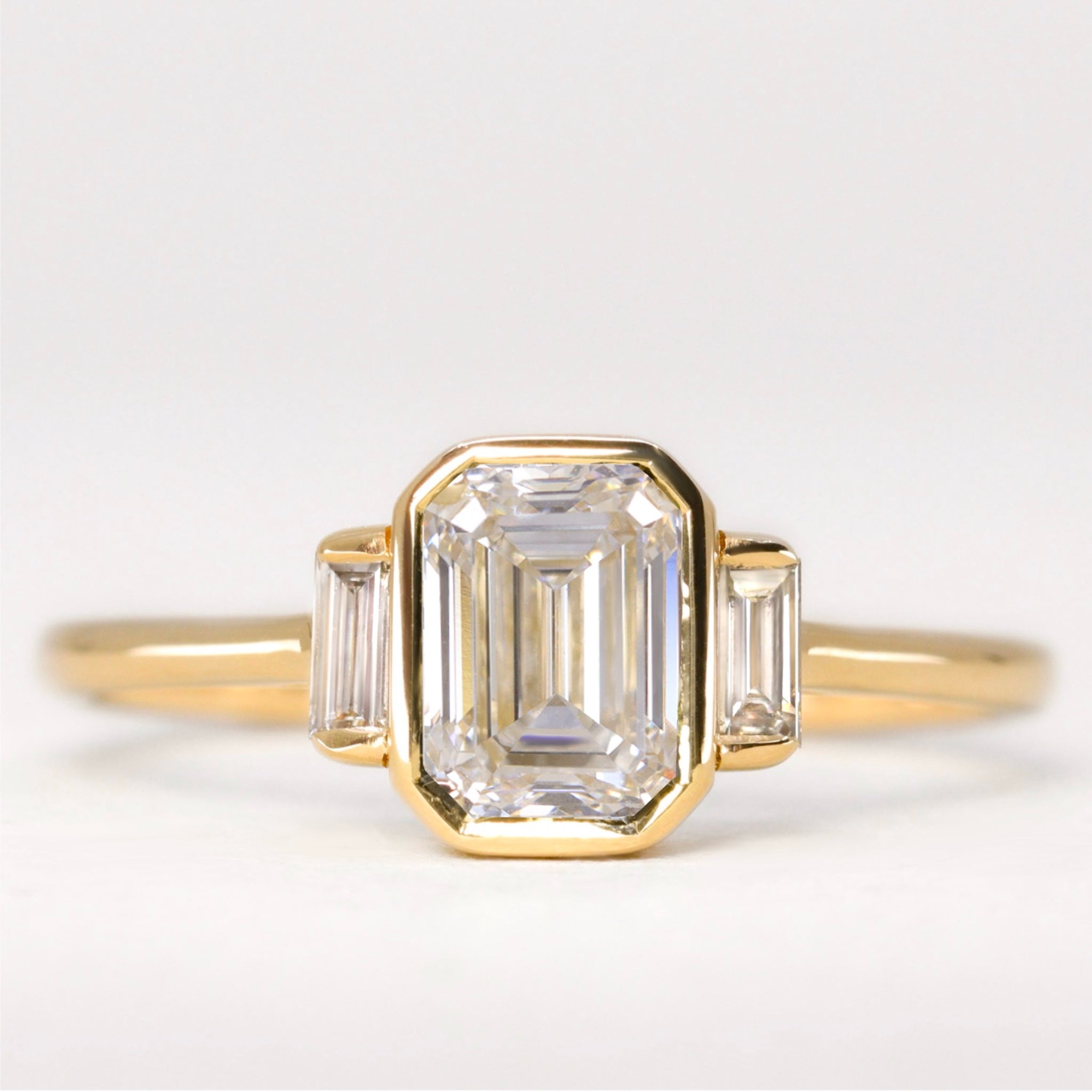 Phoebe - Emerald Cut Diamond Baguette Accents Bezel Set Trilogy Build ...